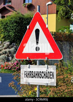 Bumps and ground waves ahead traffic sign, warning notice with red ...