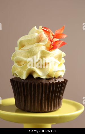Red cupcake on grey background with copy space Stock Photo - Alamy
