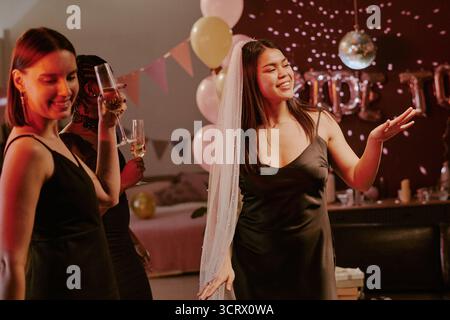Asian young adult women celebrating success achievement relaxing happy ...