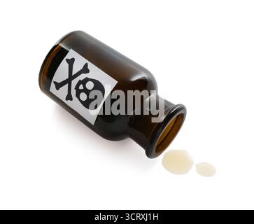 Overturned bottle of poison with warning sign isolated on white Stock ...