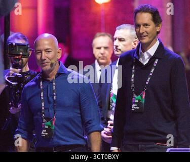 Amazon founder Jeff Bezos, right, speaks with Miami Mayor Francis ...