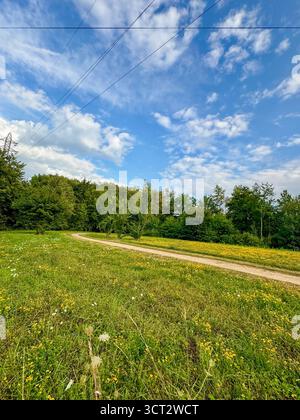 Blue Sky filled with white clouds Stock Photo - Alamy