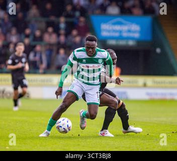 Yeovil, UK. 04th Oct, 2025. Boreham Wood's Tom White passes ball as he ...