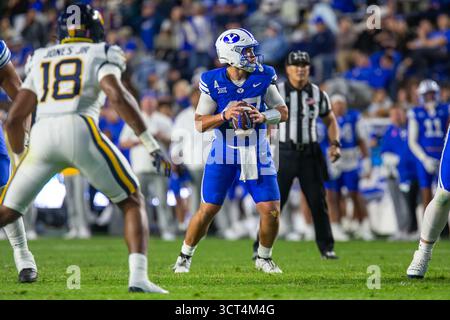 BYU quarterback Bear Bachmeier (47) is hit by Utah safety Tao Johnson ...