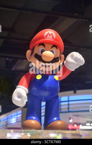 Arm raising Super Mario model Stock Photo - Alamy
