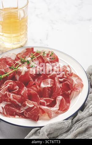 Italian sliced cured coppa ham with spices. wooden background. Top view ...
