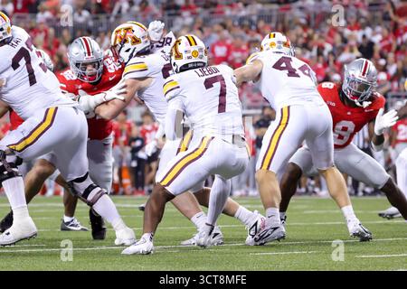 Minnesota running back Fame Ijeboi (7) is tackled by Iowa linebacker ...