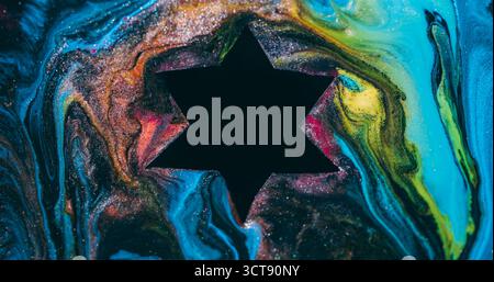 Sparkling shiny acrylic star on wooden table. christmas or new year ...