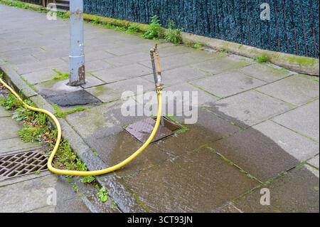 Builder's water standpipe on a pavement, UK Stock Photo - Alamy