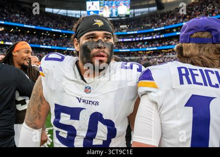 Minnesota Vikings defensive lineman Levi Drake Rodriguez moves across ...