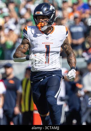 Denver Broncos tight end Evan Engram looks on before a game against the ...