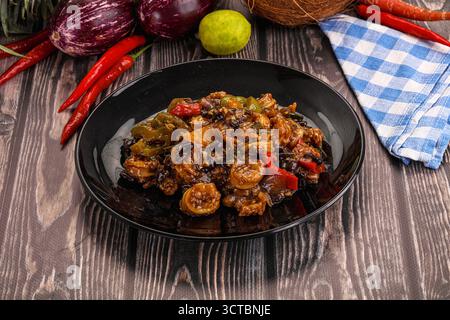 Asian cyisine - Squid with vegetables in oyser sauce Stock Photo - Alamy