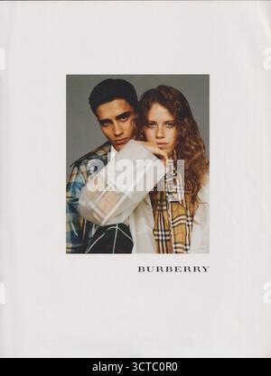 poster advertising Burberry fashion house with Emma Watson in paper ...