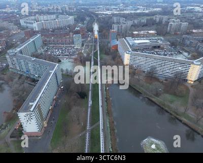 An aerial view of the railroad through buildings and nature Stock Photo ...