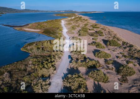 Road on a land strip between Korission lagoon and Ionia Sea in the ...