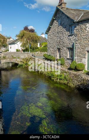 The river Eea in Cartmel village in the Lake district historically ...