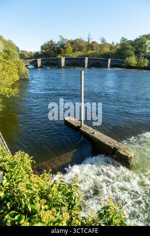 Newby Bridge (built in 1651) spans the River Leven just above the ...
