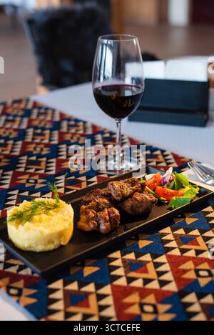 Stylish elegant table setting with colorful ceramic plates on white ...