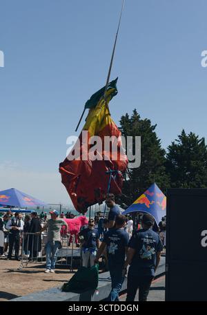 Red Bull crew members watch from the garage during the Formula One Las ...