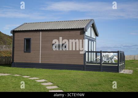 Pentewan large beach huts Stock Photo - Alamy