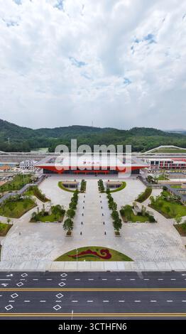 Aerial photography of Luofushan Station on Guangshan High speed Railway ...