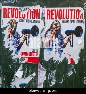Torn posters reading "Revolution Against the Billionaires – Join the ...