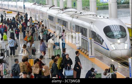 Passengers travel at Longmen Railway Station in Luoyang, central China ...