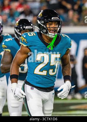 Jacksonville Jaguars safety Rayuan Lane III (25) runs alongside Arizona ...