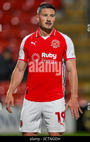 Ronan Coughlan of Fleetwood Town during the The Vertu Trophy Group G ...