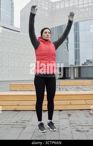 Warming-up before exercises and running Stock Photo - Alamy