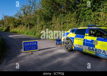 Garda road closed sign in Ireland Stock Photo - Alamy