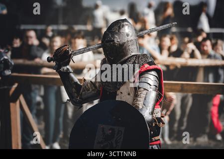 Ancient metal armor of the medieval knight. Dark vertical photo Stock ...