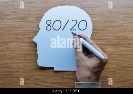 80 20 pareto principle concept, inscription on paper notebook Stock ...