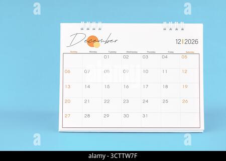 December 2026, Monthly desk calendar for 2026 year on yellow and blue ...