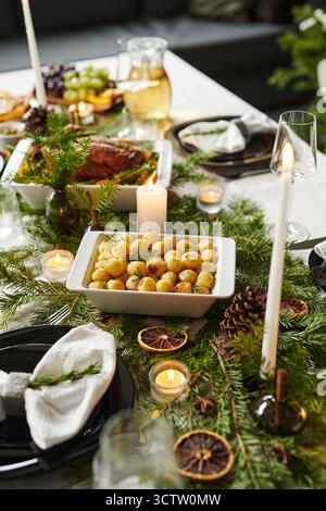 Festive table setting with Christmas decor in kitchen Stock Photo - Alamy