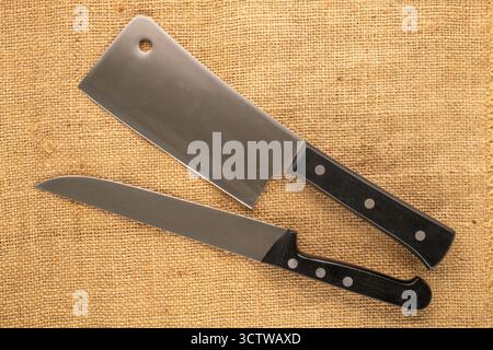 Kitchen knives on jute cloth, macro, top view Stock Photo - Alamy