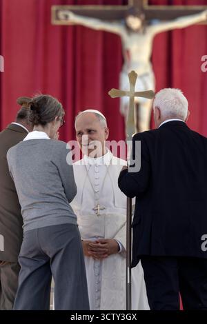 Pope Leo XIV greets the faithful after reciting the Angelus noon prayer ...