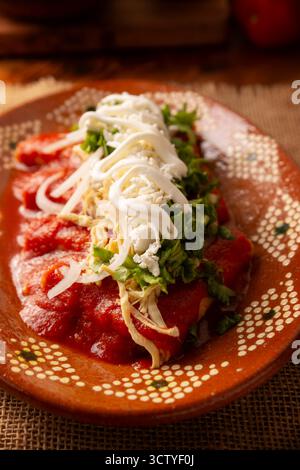 Entomatadas. Also known as Enjitomatadas, a typical dish of Mexican ...