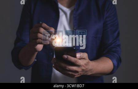 Man using smartphone for online tax filing and mobile financial ...