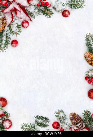 Red poinsettia flower and twigs of Christmas tree with satin ribbons ...