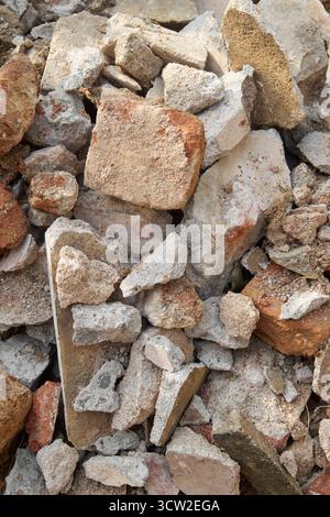 Pile of gray concrete bricks in the middle of a city park construction ...