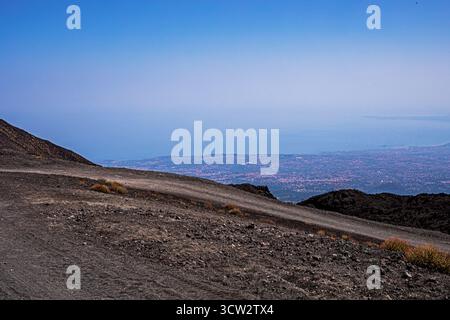 Road to the ascent and descent of Etna Volcano with a beautiful view of ...