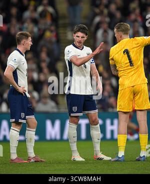 Declan Rice and Jordon Pickford of England in action during the ...