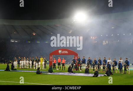 Players take the field during the World Cup Group I soccer match ...