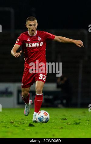 Kristoffer Lund (1. FC Cologne, #32) in a duel, fight for the ball with Romano Schmid (SV Werder ...