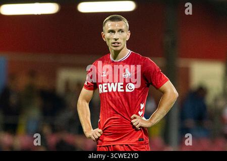 Kristoffer Lund (1. FC Cologne, #32) in a duel, fight for the ball with Romano Schmid (SV Werder ...