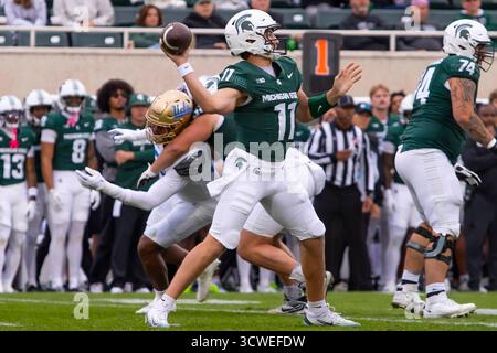 Michigan State quarterback Alessio Milivojevic looks to pass during the ...