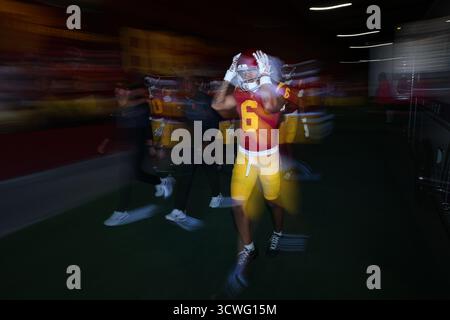Southern California wide receiver Makai Lemon (6) applies stiff arm to ...