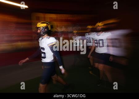 Michigan kicker Dominic Zvada (96), with punter Hudson Hollenbeck (90 ...