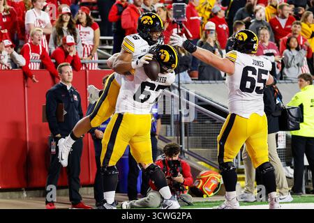 Iowa offensive lineman Gennings Dunker stands on the field before an ...